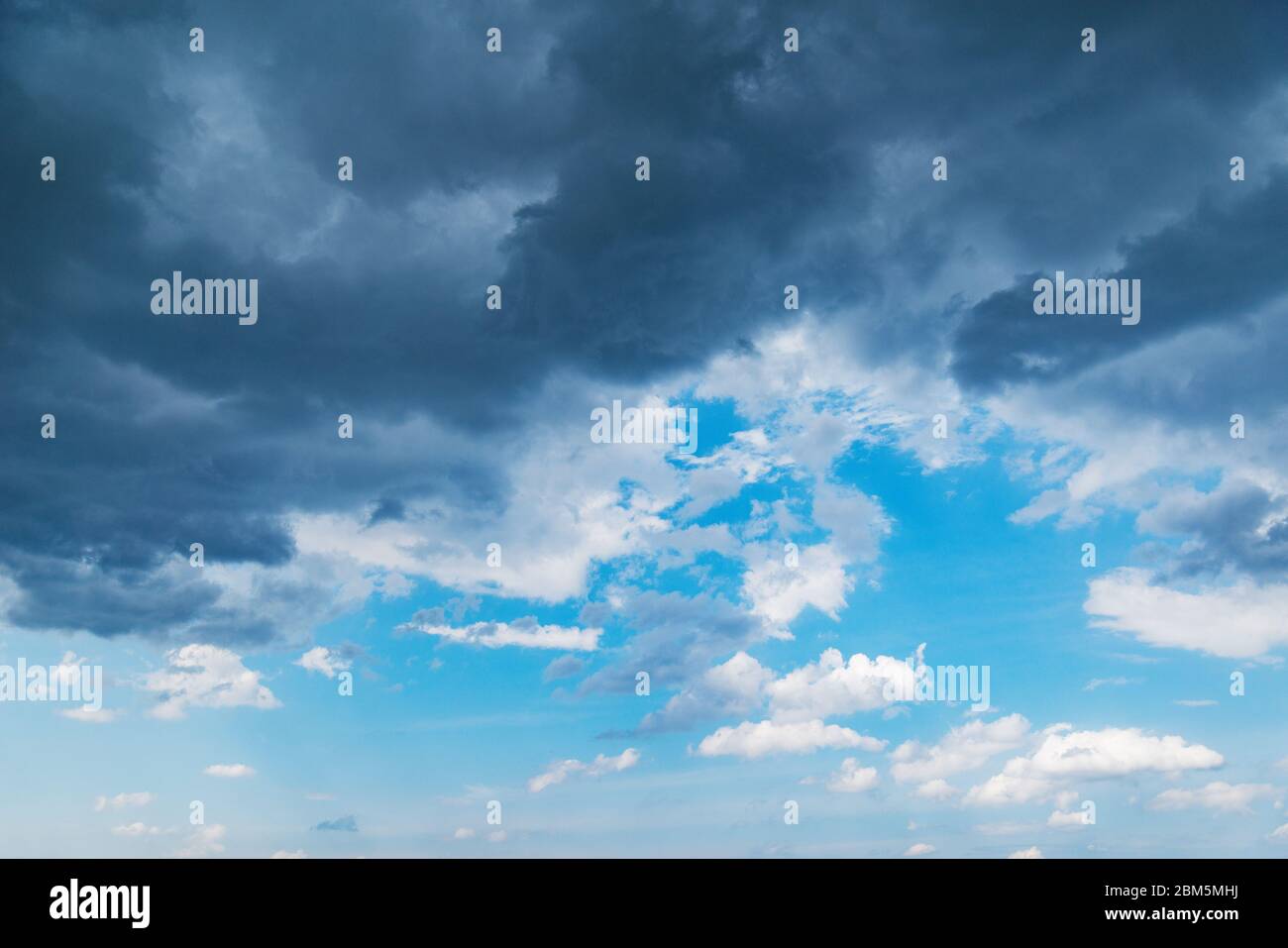 Dark storm clouds before rain at sunset. Weather changes Stock Photo ...