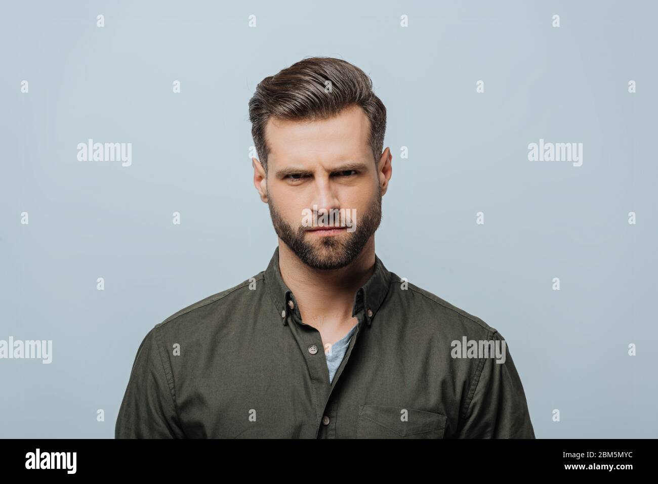 Serious man looking at camera hi-res stock photography and images - Alamy