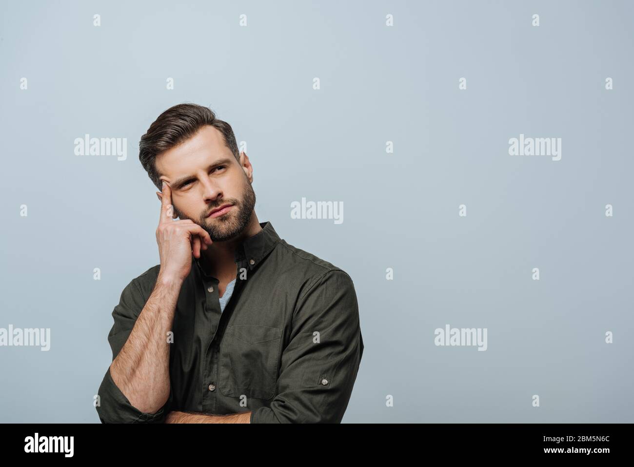 Finger on forehead hi-res stock photography and images - Alamy