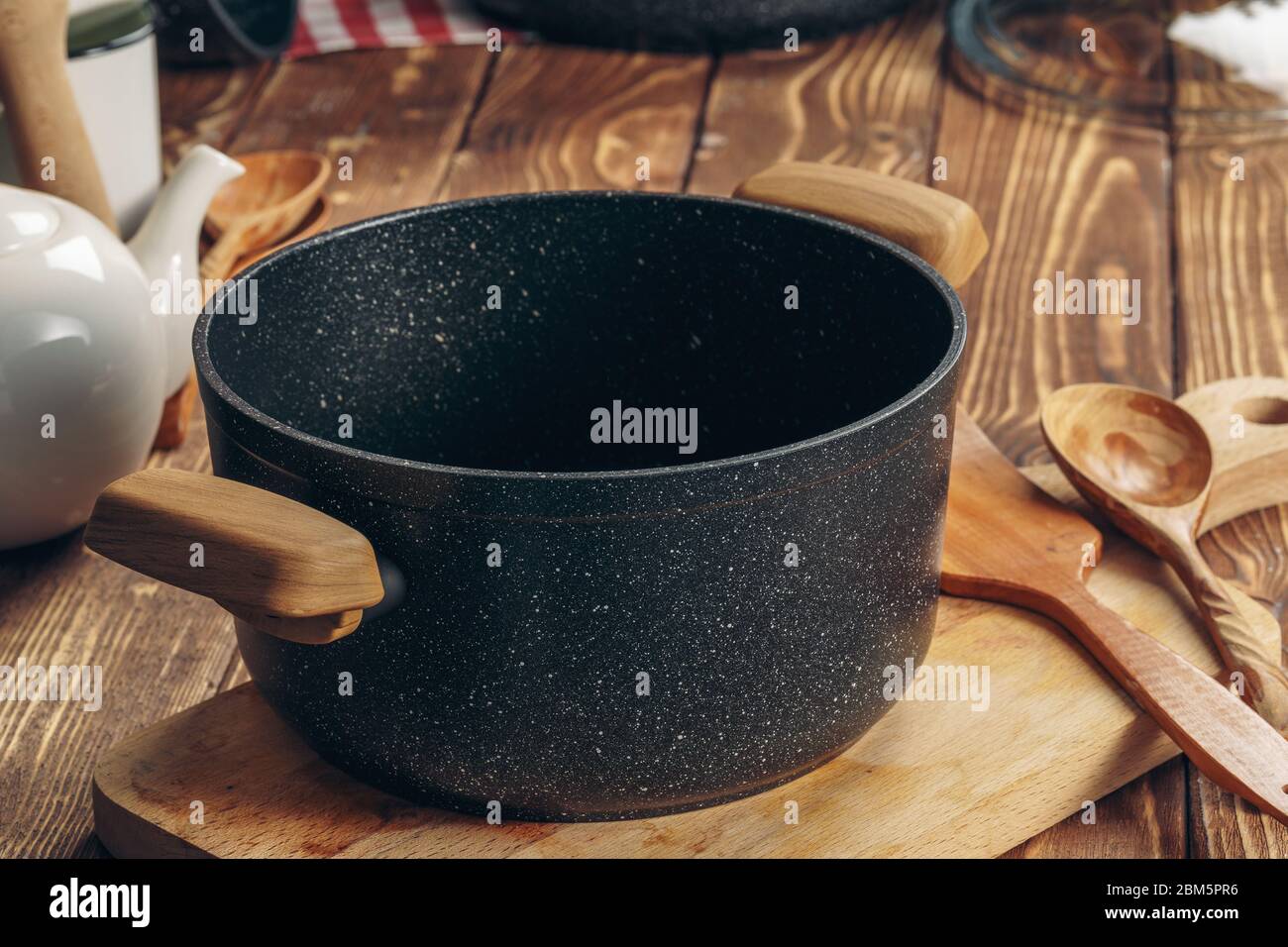 Set of cookware utensils on a kitchen counter Stock Photo - Alamy
