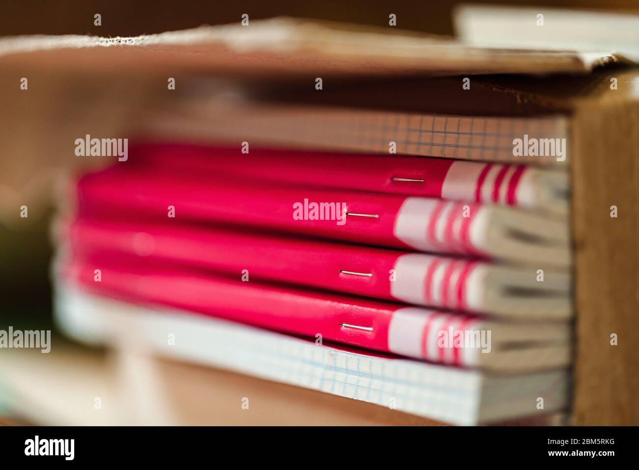 Cardboard sheets pack on a shelf of warehouse Stock Photo - Alamy