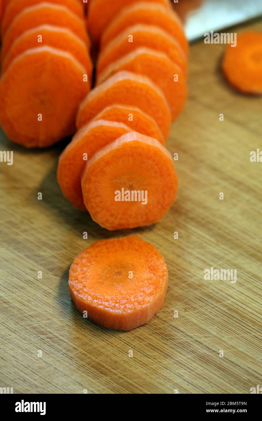 Carrot cut in slices hi-res stock photography and images - Alamy