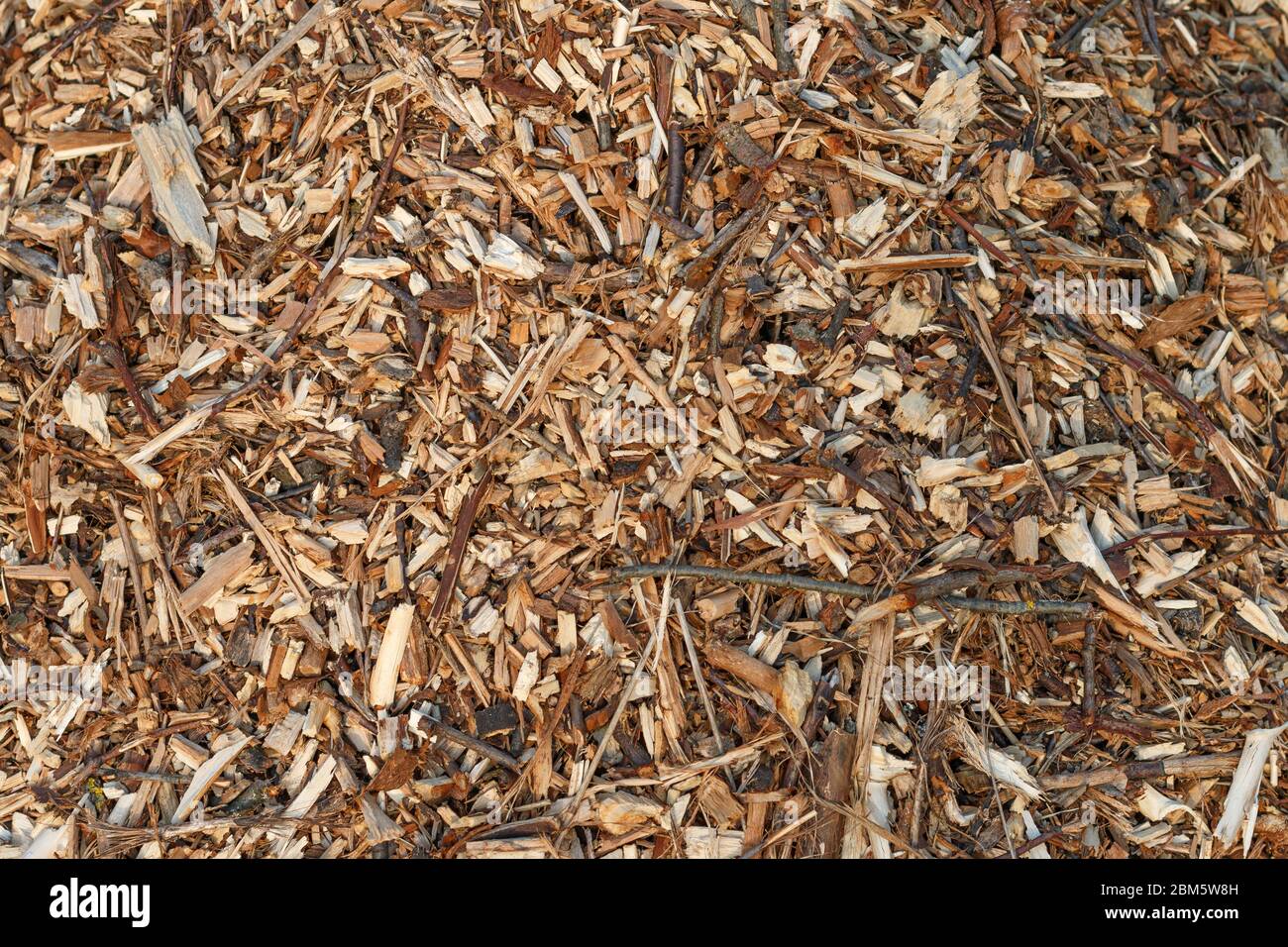 pile of dried small wood pieces and chips background Stock Photo - Alamy
