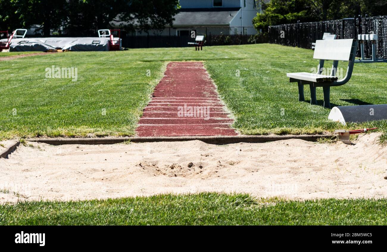High school long jump, triple jump and pole vault area surrounded by ...