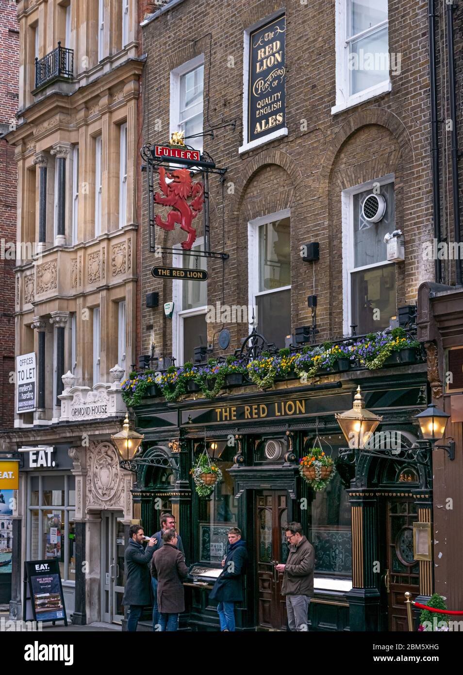 Men smoking outside of the Red Lion pub in York Street. The Red Lion ...