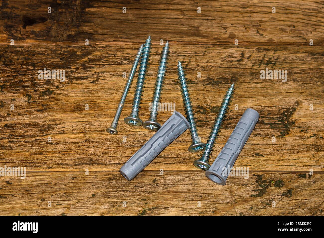 Close up photo of screws, set of screws in a construction abstraction ...
