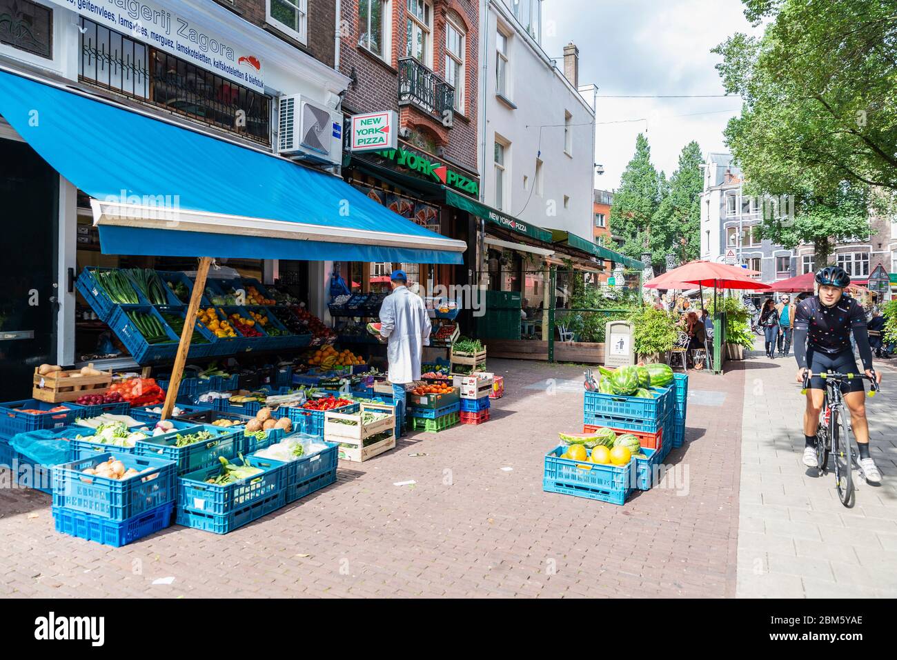 Amsterdam, Netherlands - September 8, 2018: Vendor in a fruit and ...