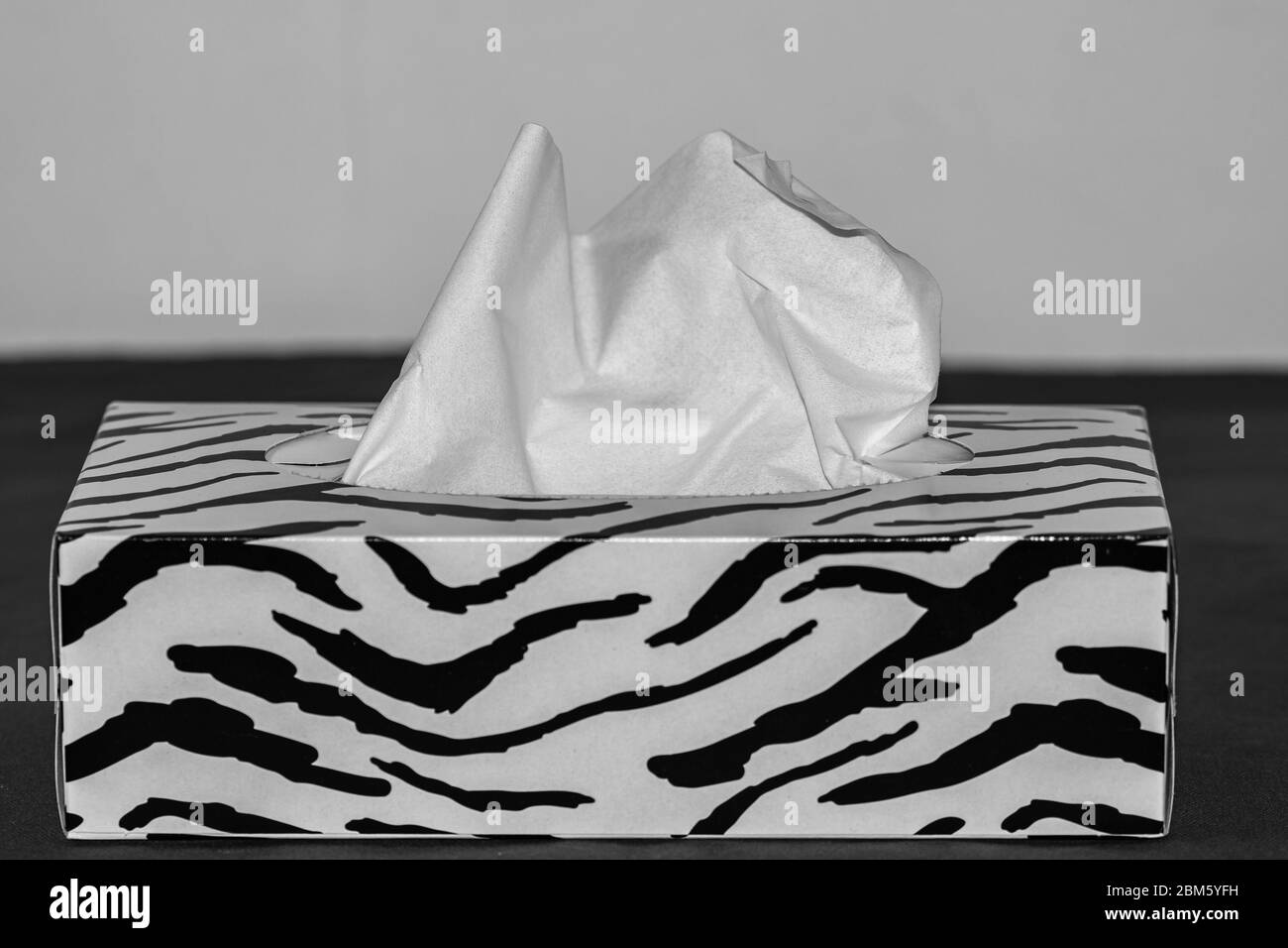 Close up of colorful tissue box isolated Stock Photo - Alamy