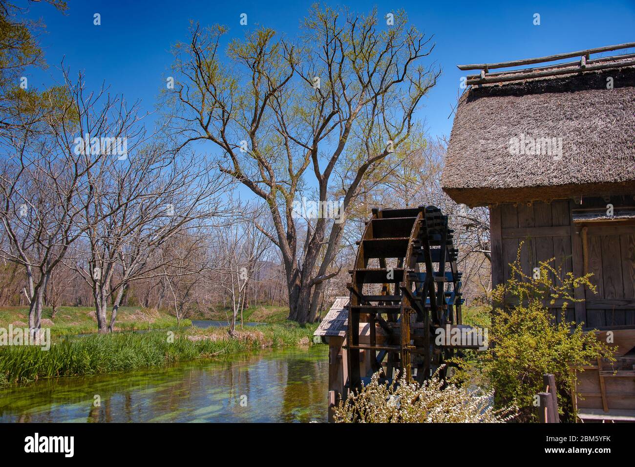 Water wheel turning in azumino hi-res stock photography and images - Alamy