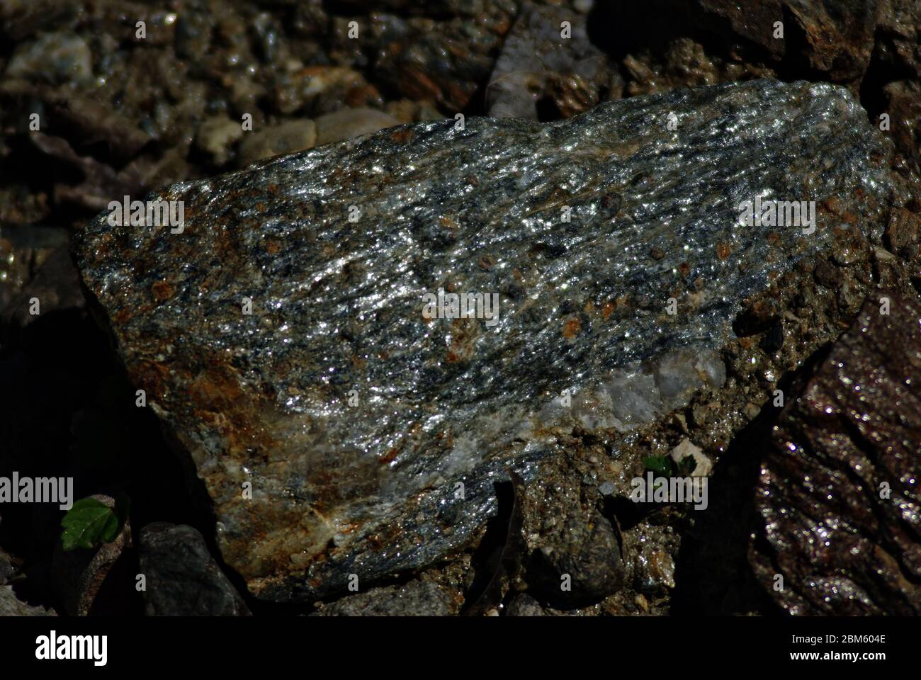 Glittering and sparkling rock at sunny summer day Stock Photo - Alamy