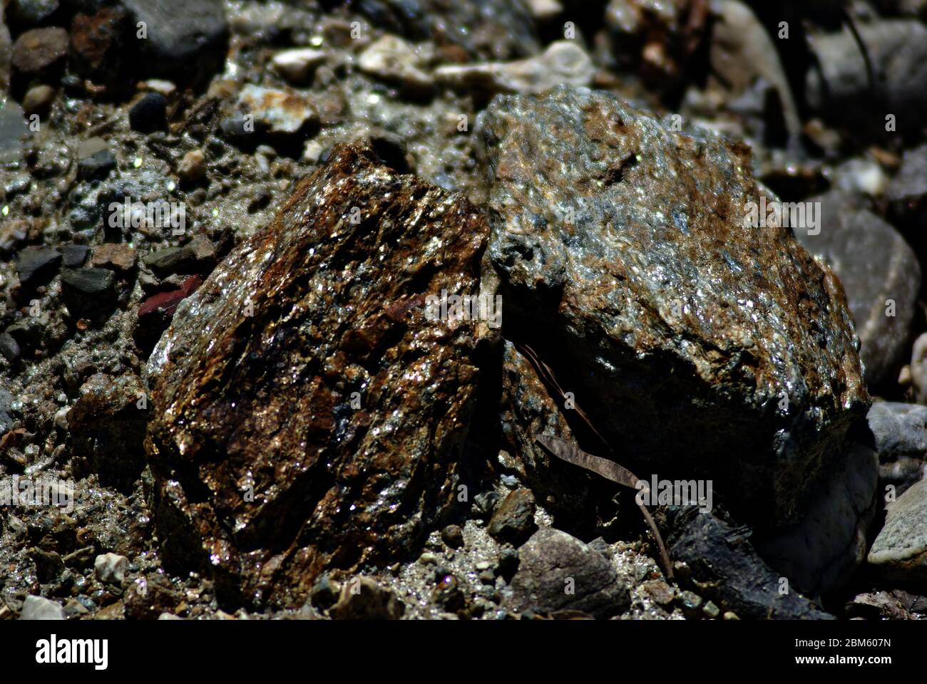 Glittering and sparkling rock at sunny summer day Stock Photo - Alamy