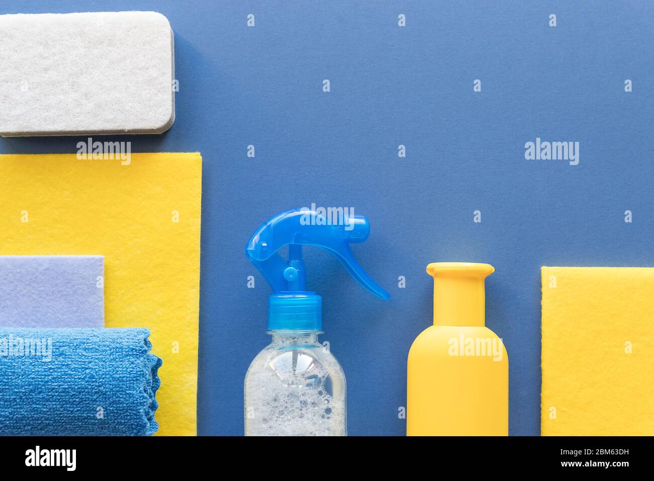 House cleaning and housekeeping, blue background. Detergents for ...