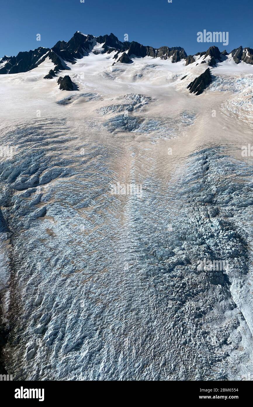 Aerial view of glacier ice at Mount Cook National Park, New Zealand ...