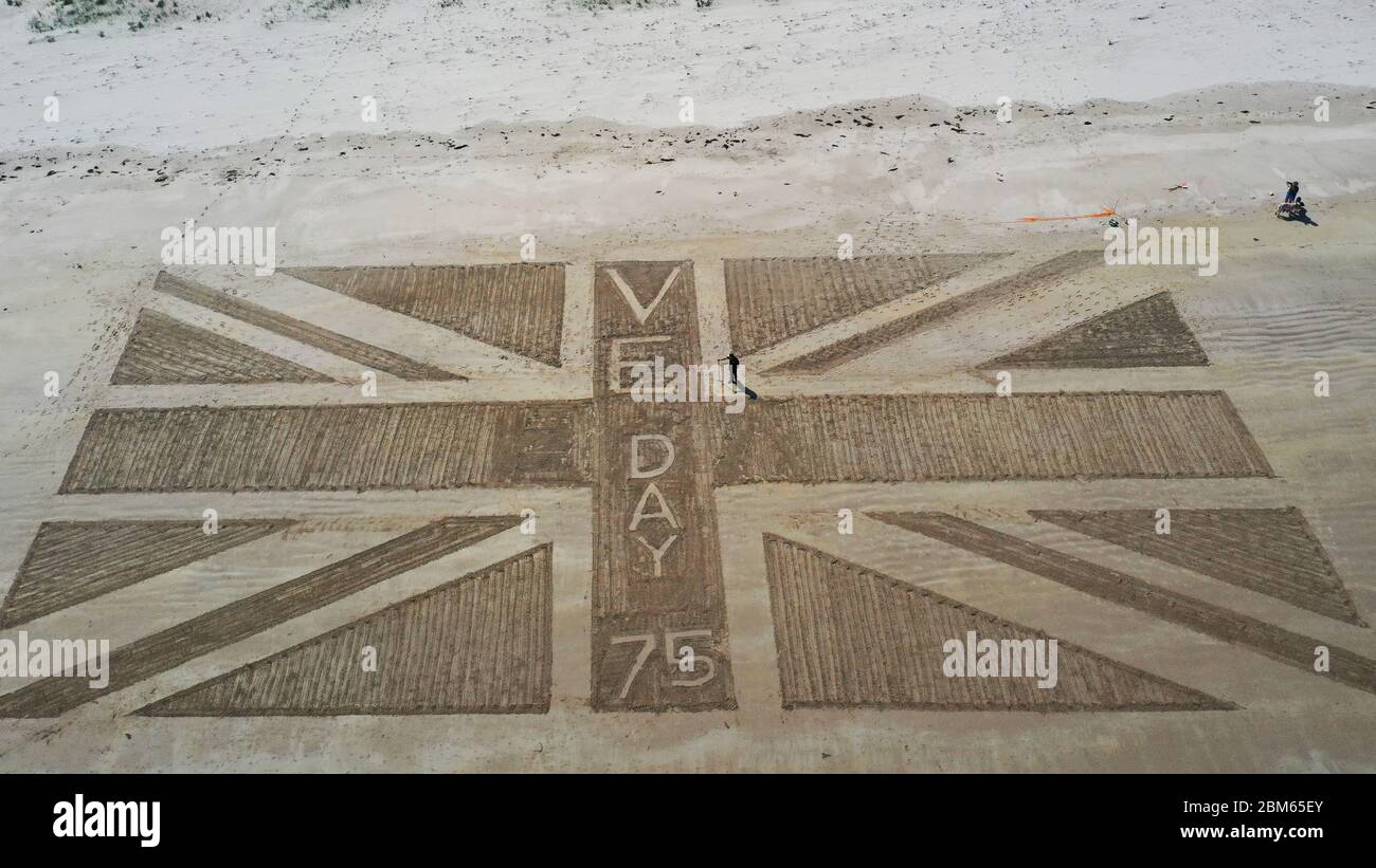 Andrew Heeley, 56, a maintenance manager at Bamburgh Castle, draws a ...