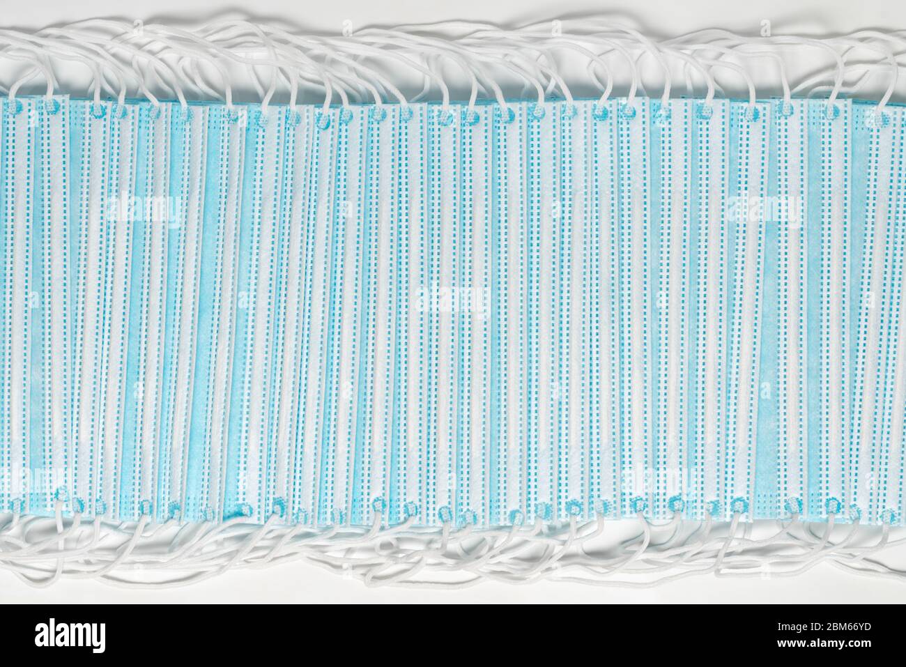 Medical and surgical face masks on white background. Close-up view of ...