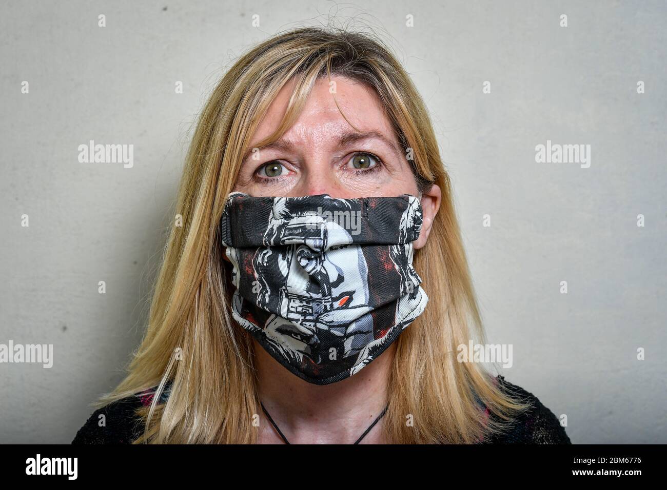 Teacher Elaine Watson, 58, from Croscombe village, near Wells, wears a ...