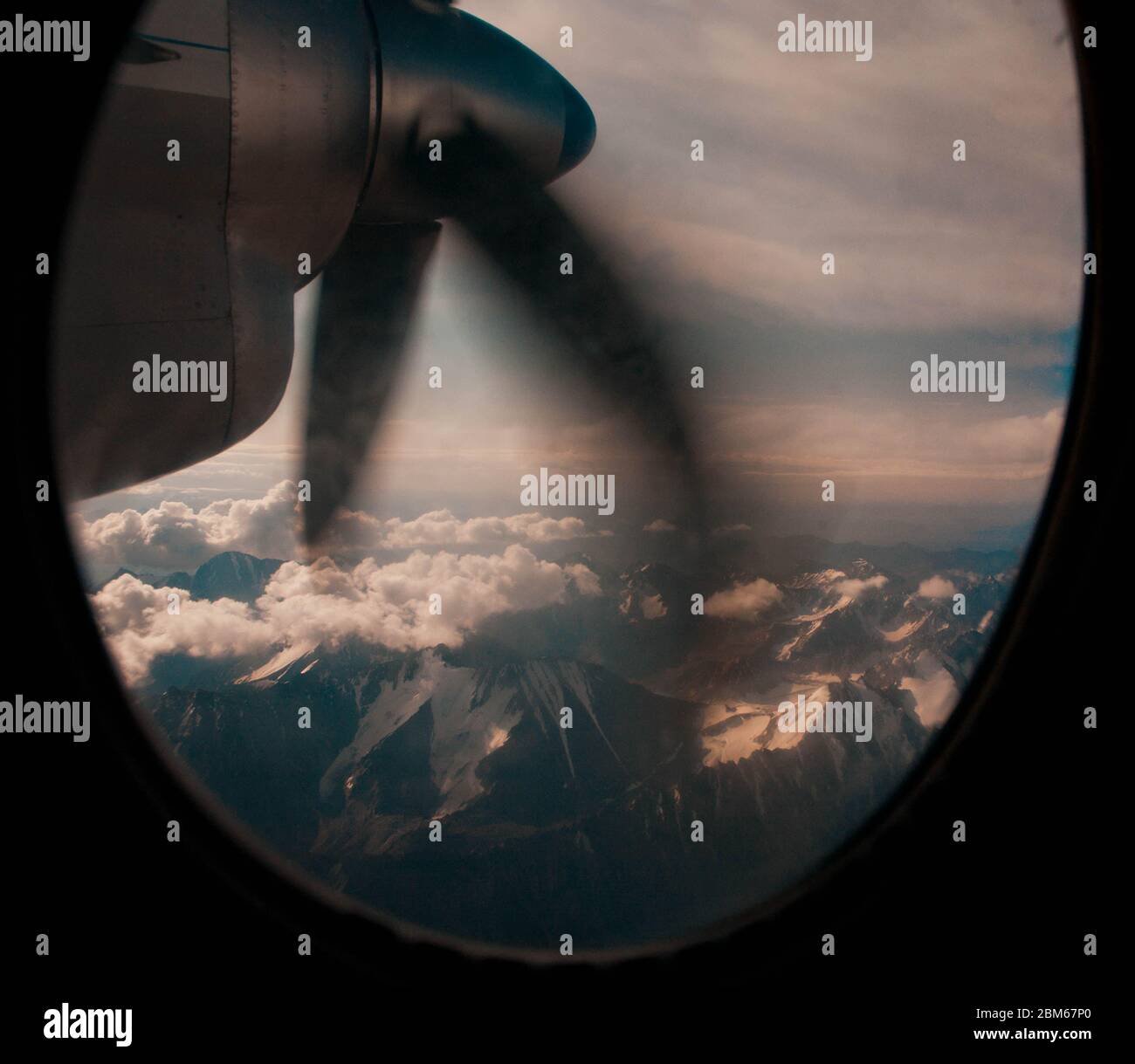 View from the plane's illuminator on a rotating propeller. Flying at ...