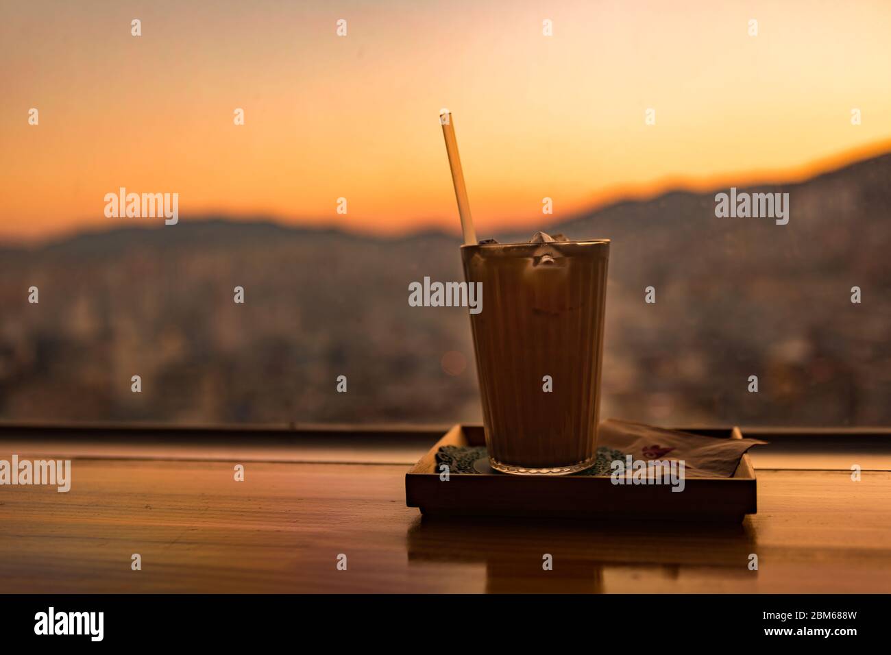 the sunset of a cafe Stock Photo - Alamy