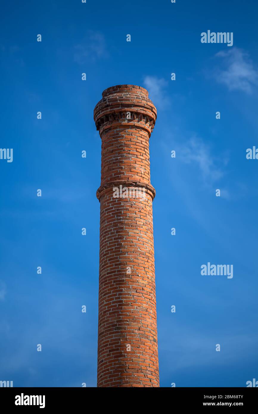 View of a industrial chimney made with orange massive brick Stock Photo ...