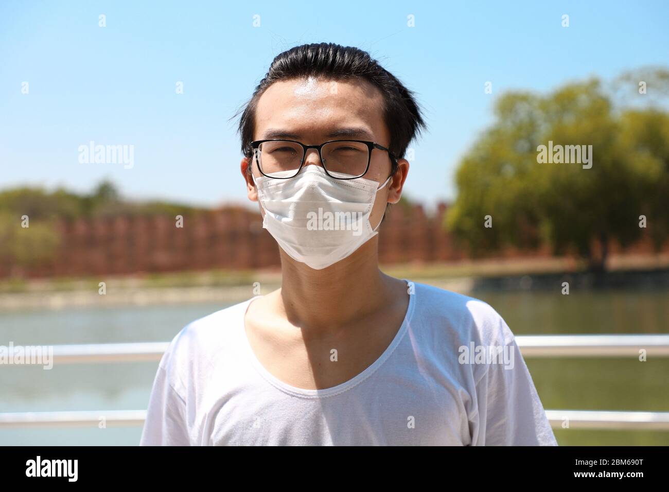Man wearing hygienic mask to prevent infection Stock Photo - Alamy