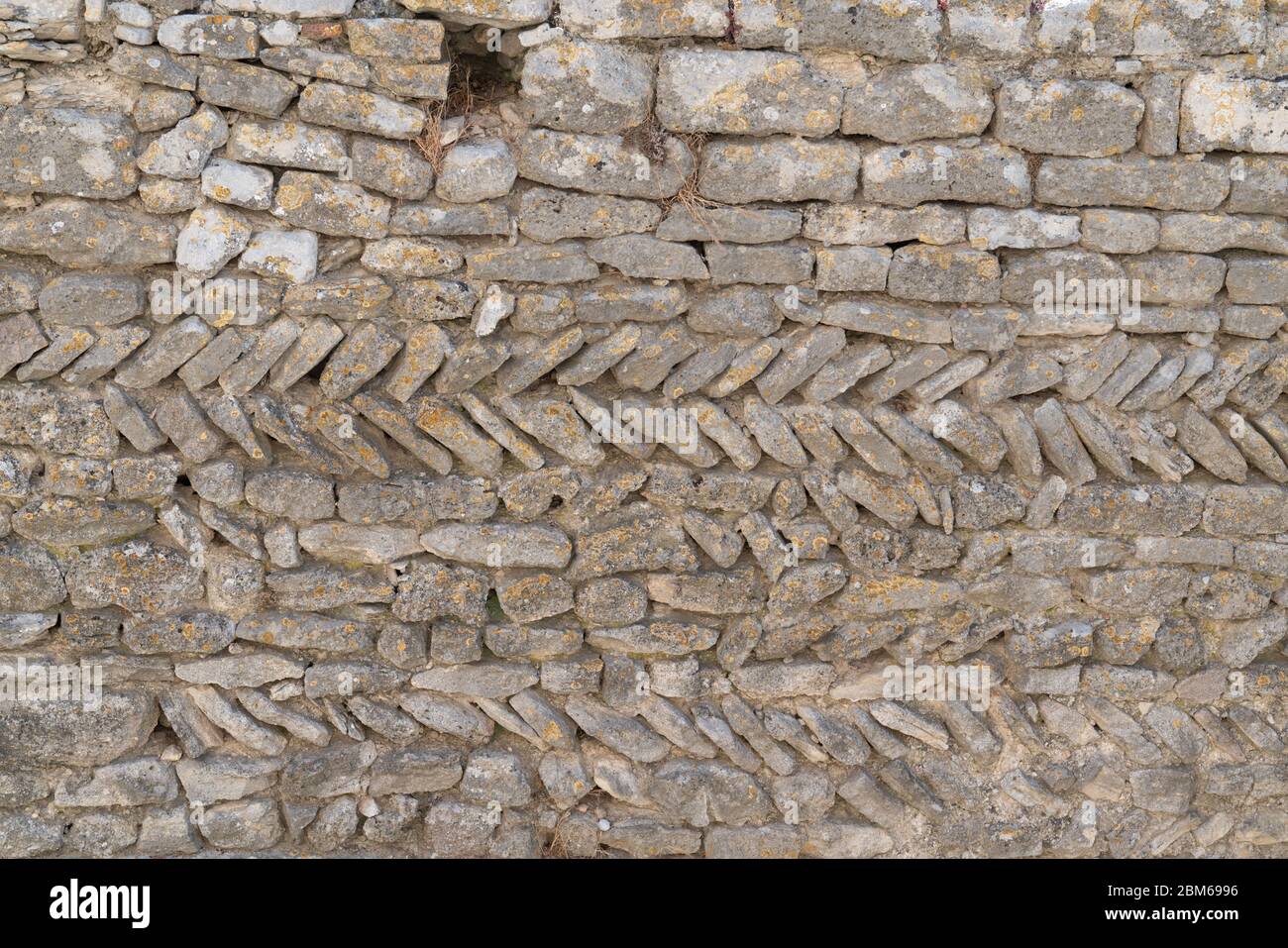 Ancient wall of dry masonry Stone texture in the historic city of ...