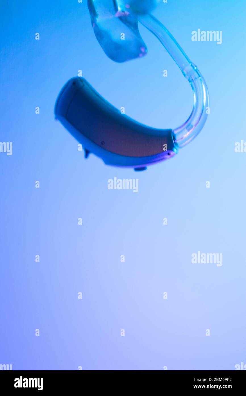 Modern digital hearing aid for deafness and deaf people Stock Photo - Alamy