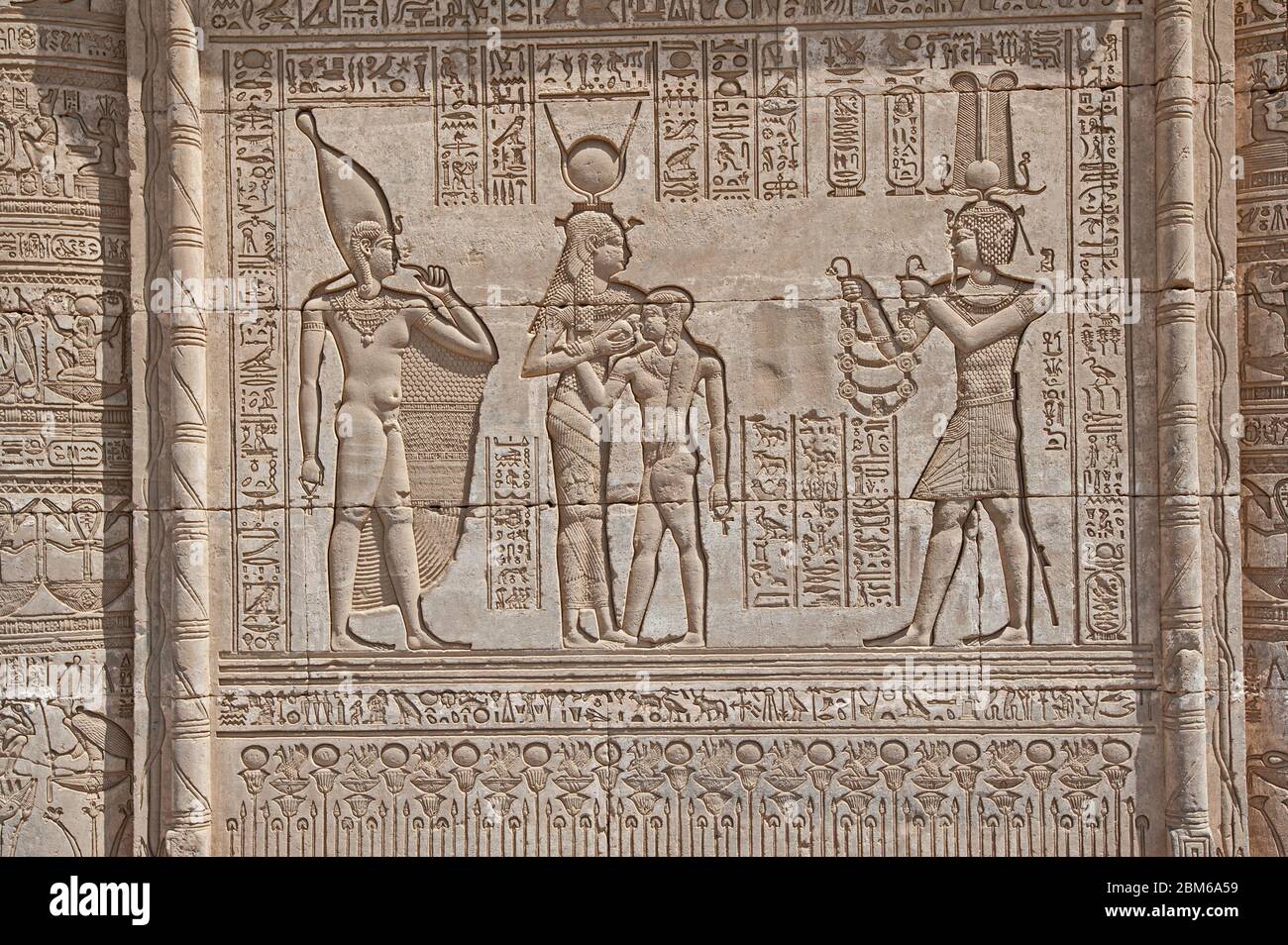 Hieroglypic carvings on wall at the ancient egyptian temple of Hathor ...