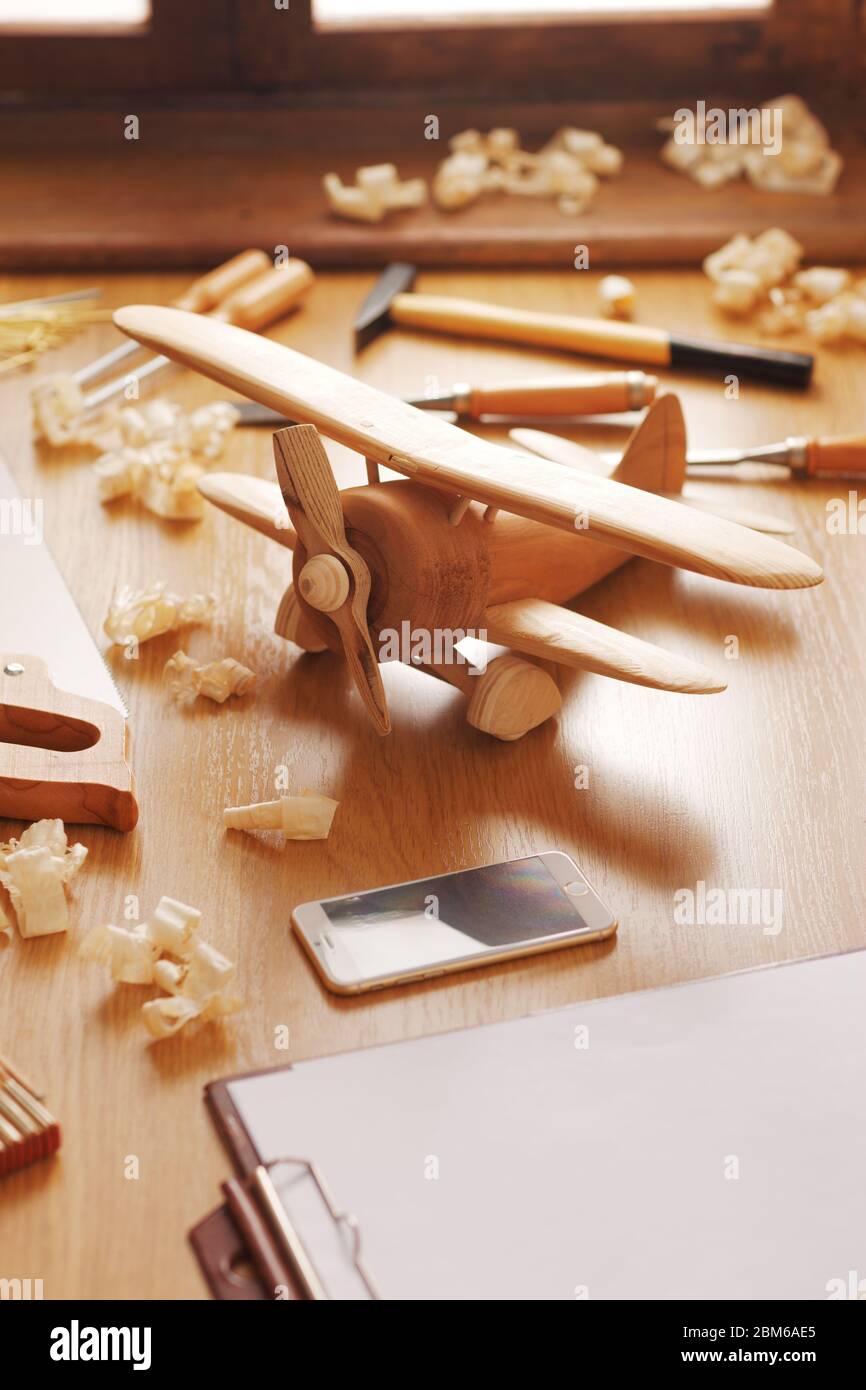 DIY project at home concept, work table with handmade wooden toy ...