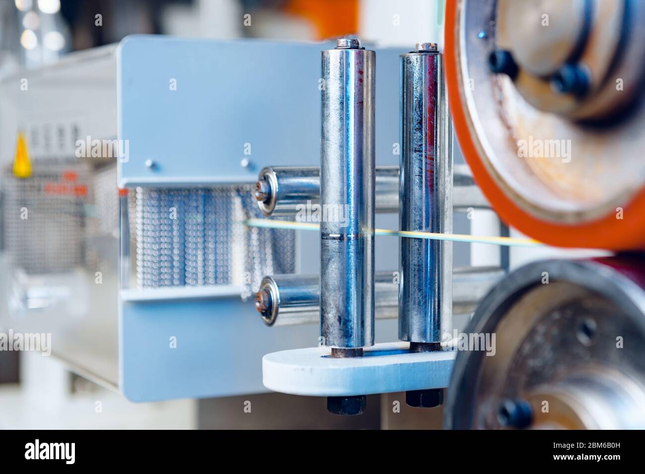 Inside a modern plant producing power electric cables and optical ...