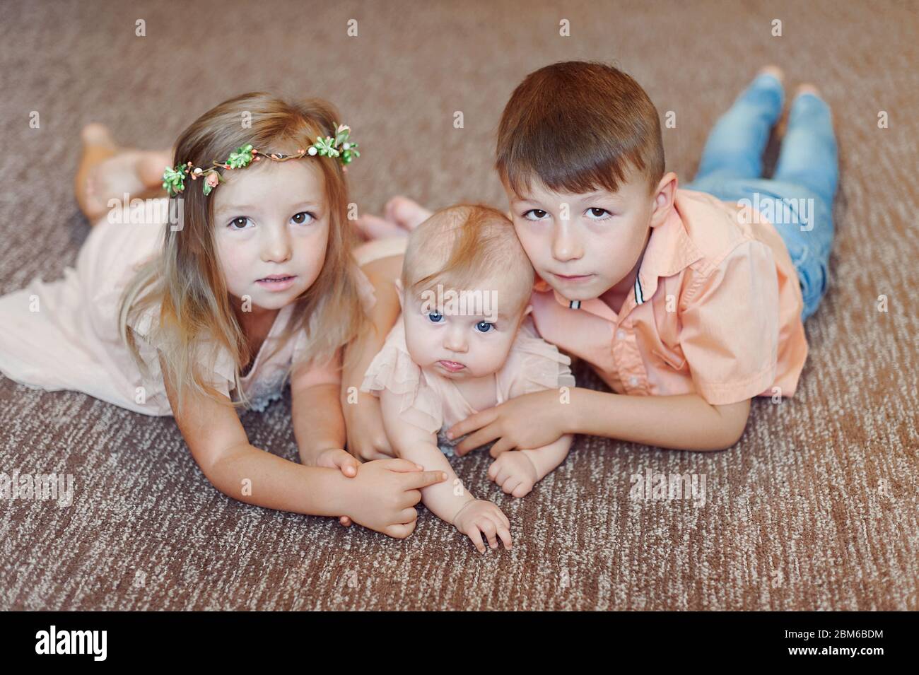 Little Children Together Hangout and Smiling in studio on floor ...