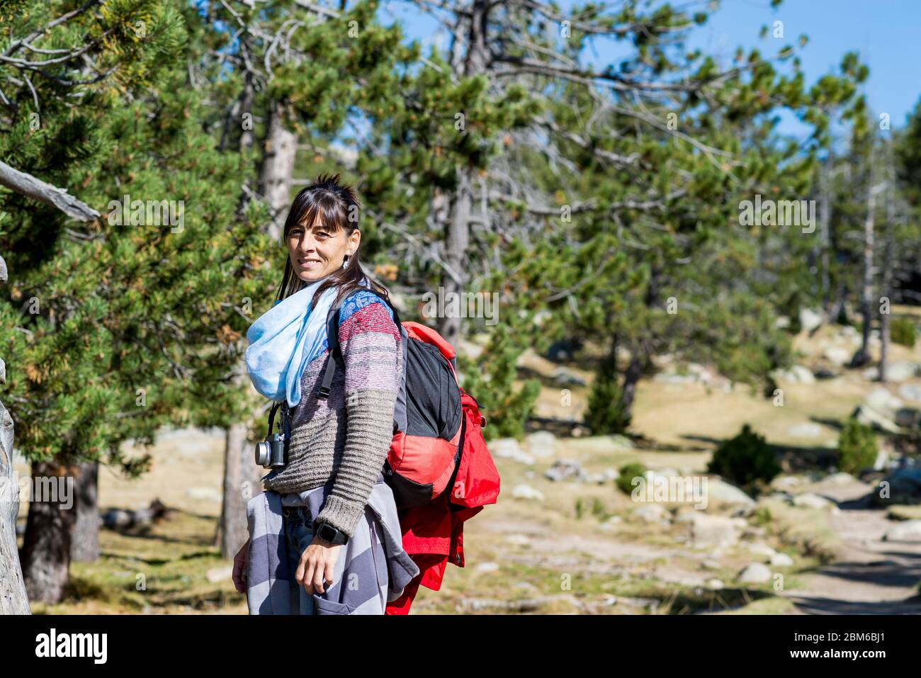 Female hiker smiling at camera hi-res stock photography and images - Alamy