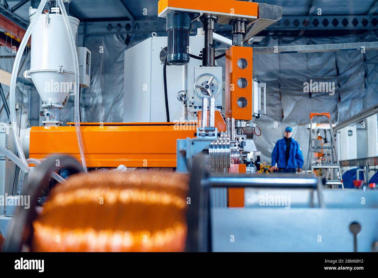 Production of copper wire, cable in reels at factory. Cable factory ...