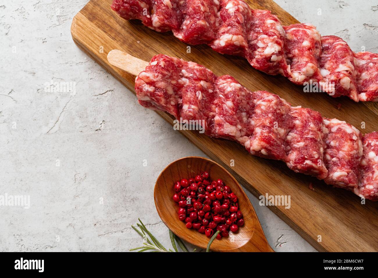 Raw turkish traditional meat kebab on the table Stock Photo - Alamy