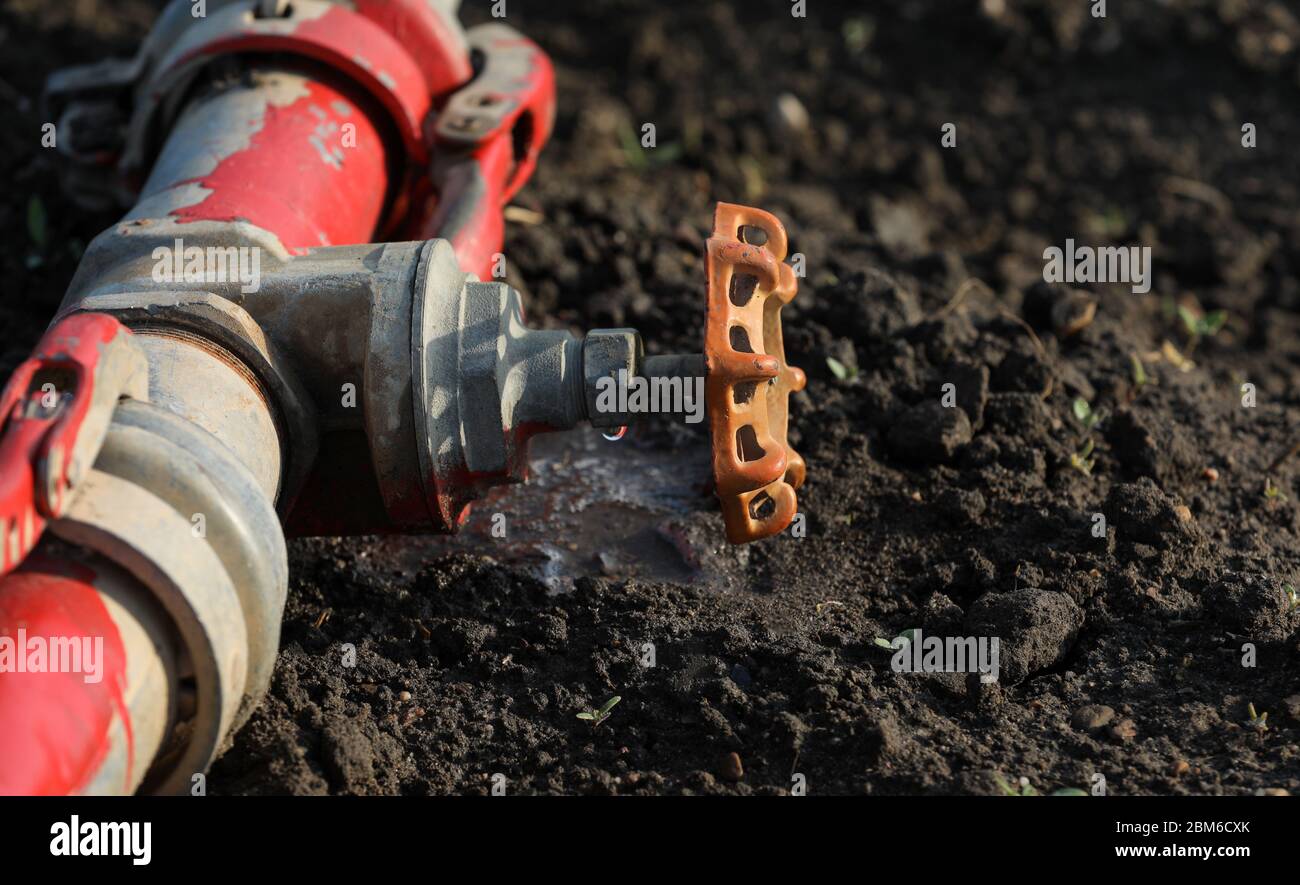 Water pipes on a field Stock Photo - Alamy