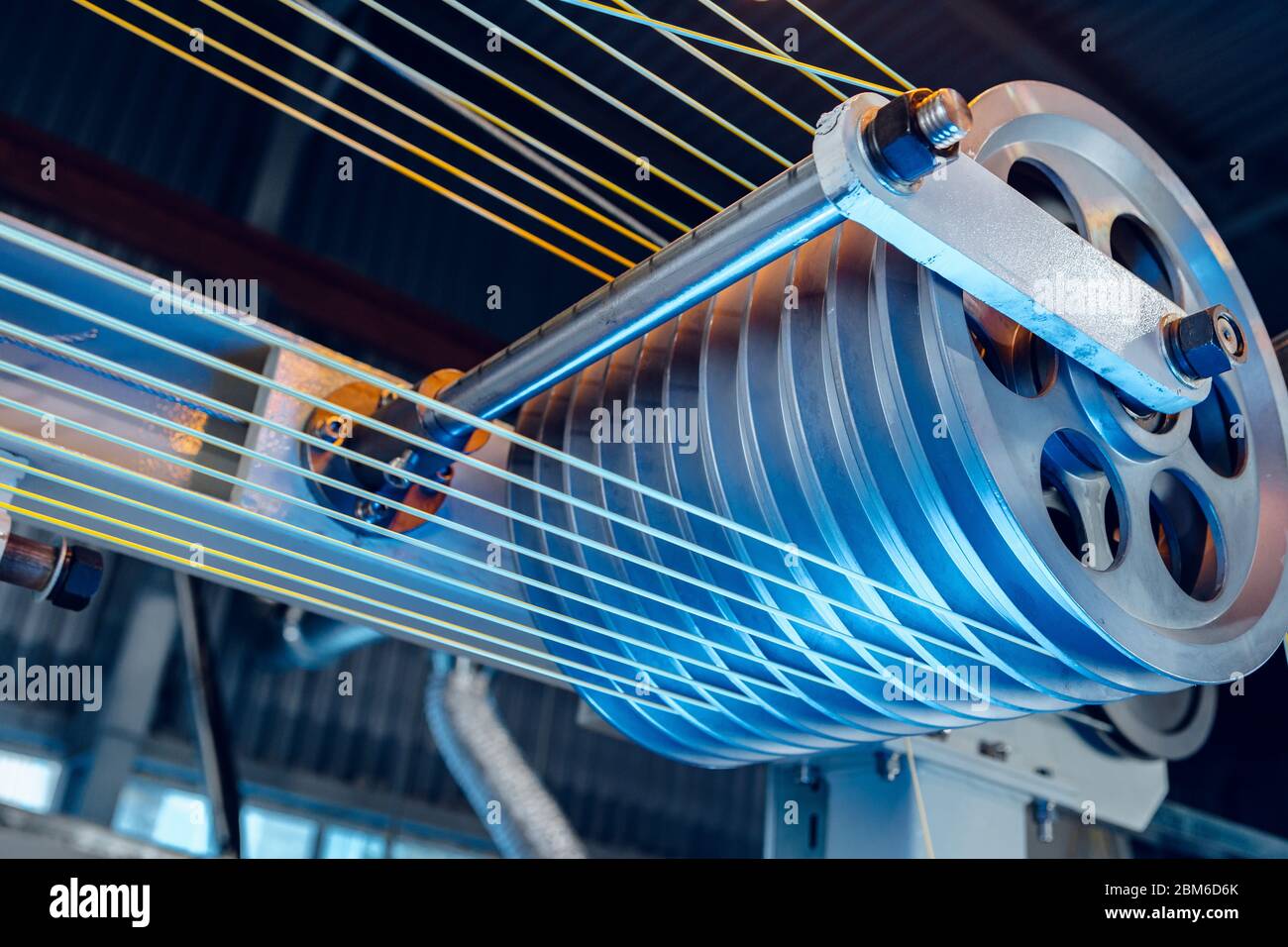 Inside a modern plant producing power electric cables and optical ...