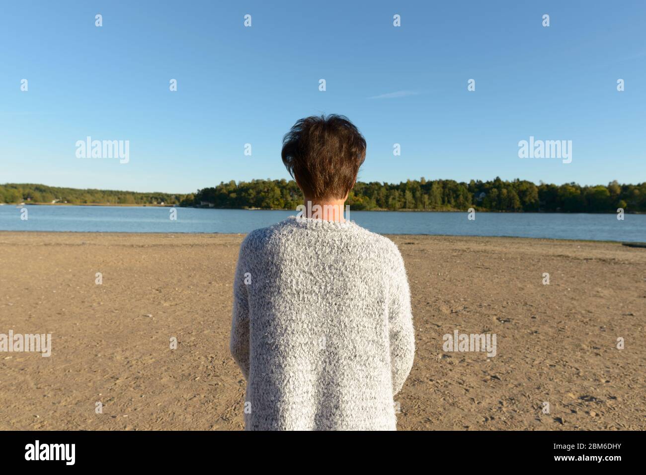 Mature woman rear view looking at sky hi-res stock photography and ...