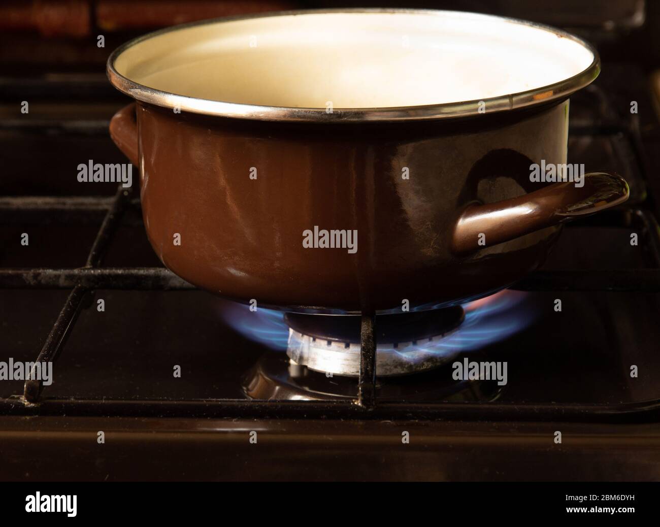 Burning gas on stove grill hi-res stock photography and images - Alamy