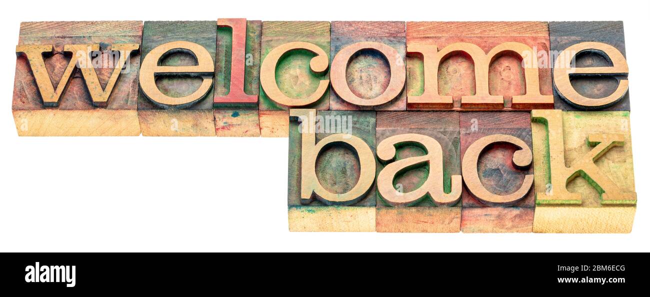 Welcome back sign - isolated text in letterpress wood type, business ...