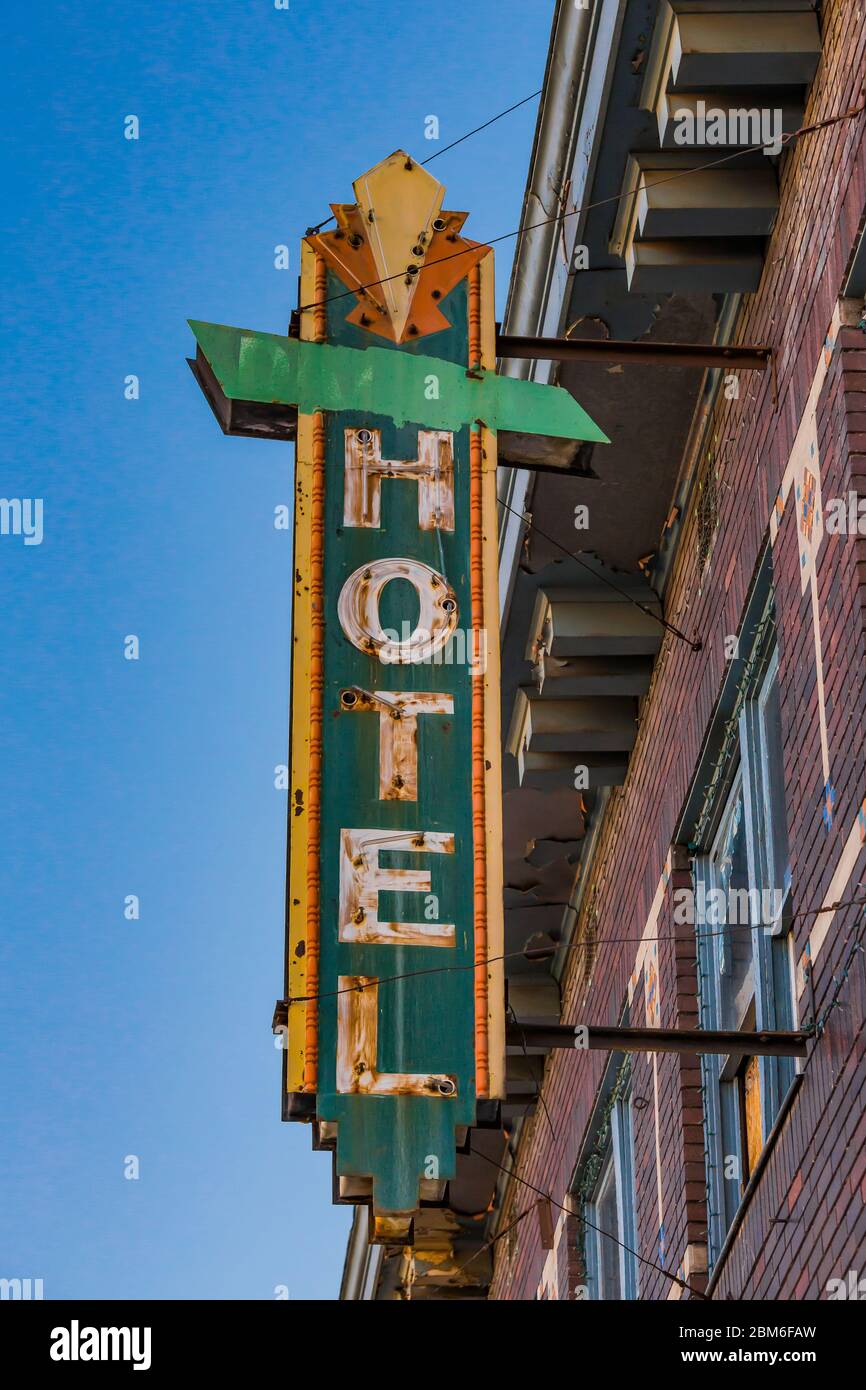 Old and rusty and weathered Hotel sign on Main Street in Helper, Utah ...