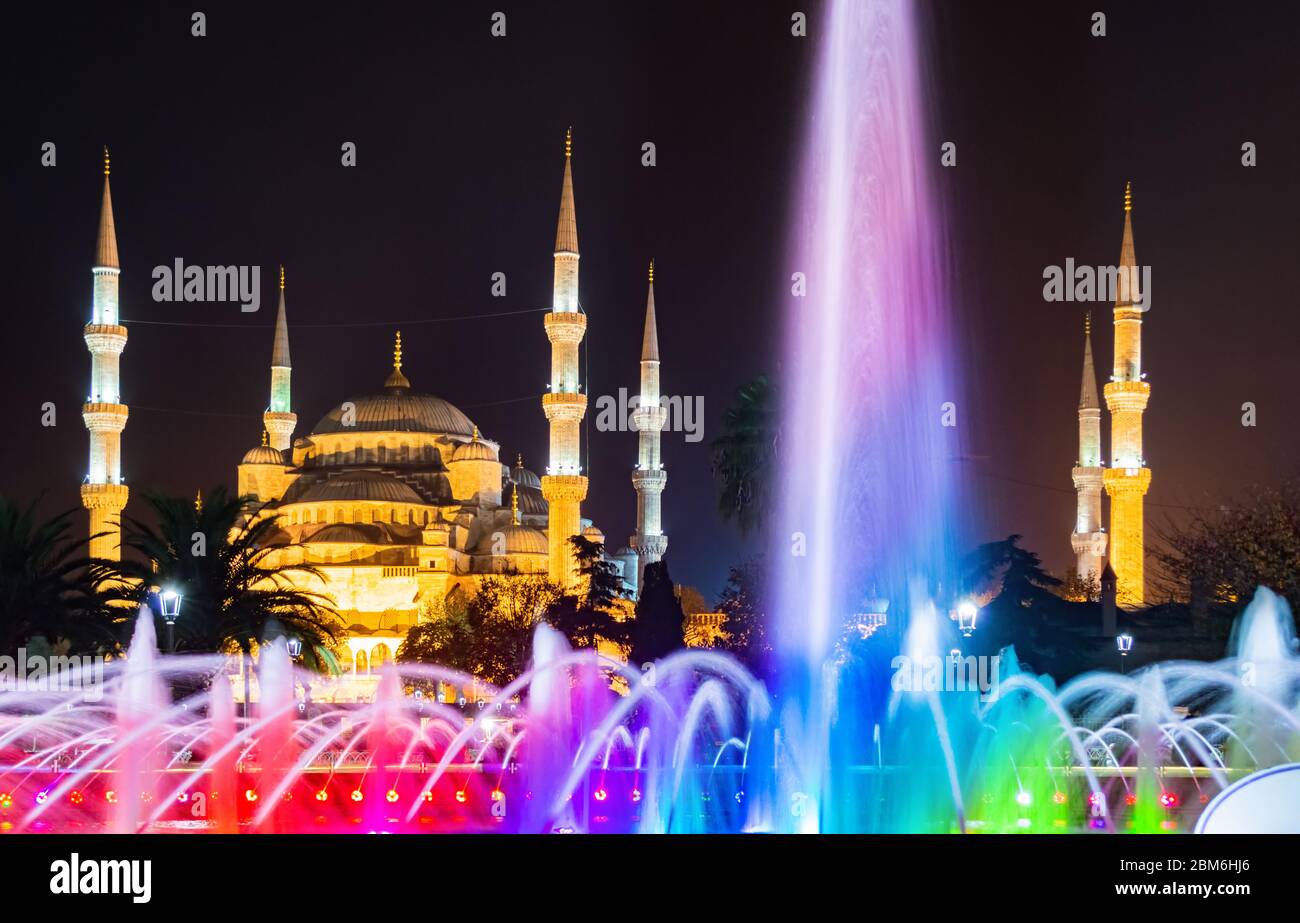 Blue Mosque at night with colorful fountains (from several photos ...