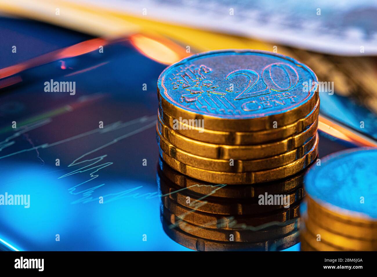 Euro coin on stock chart. Financial investment concept Stock Photo - Alamy