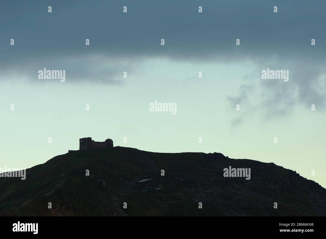 Old stone observatory on top of the mountain Stock Photo - Alamy