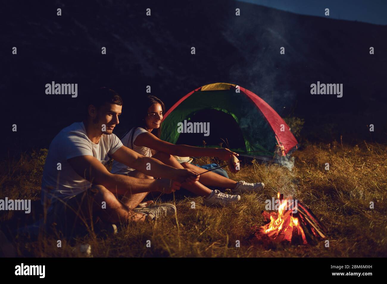 Campfire romance hi-res stock photography and images - Alamy
