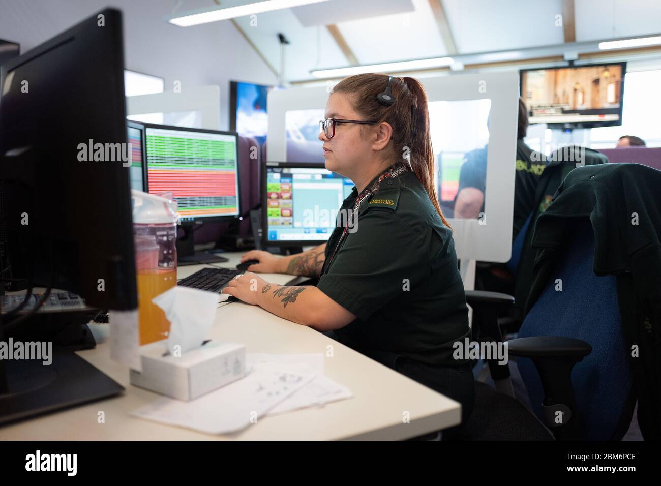 A South Central Ambulance Service dispatch team member assigns a job to ...
