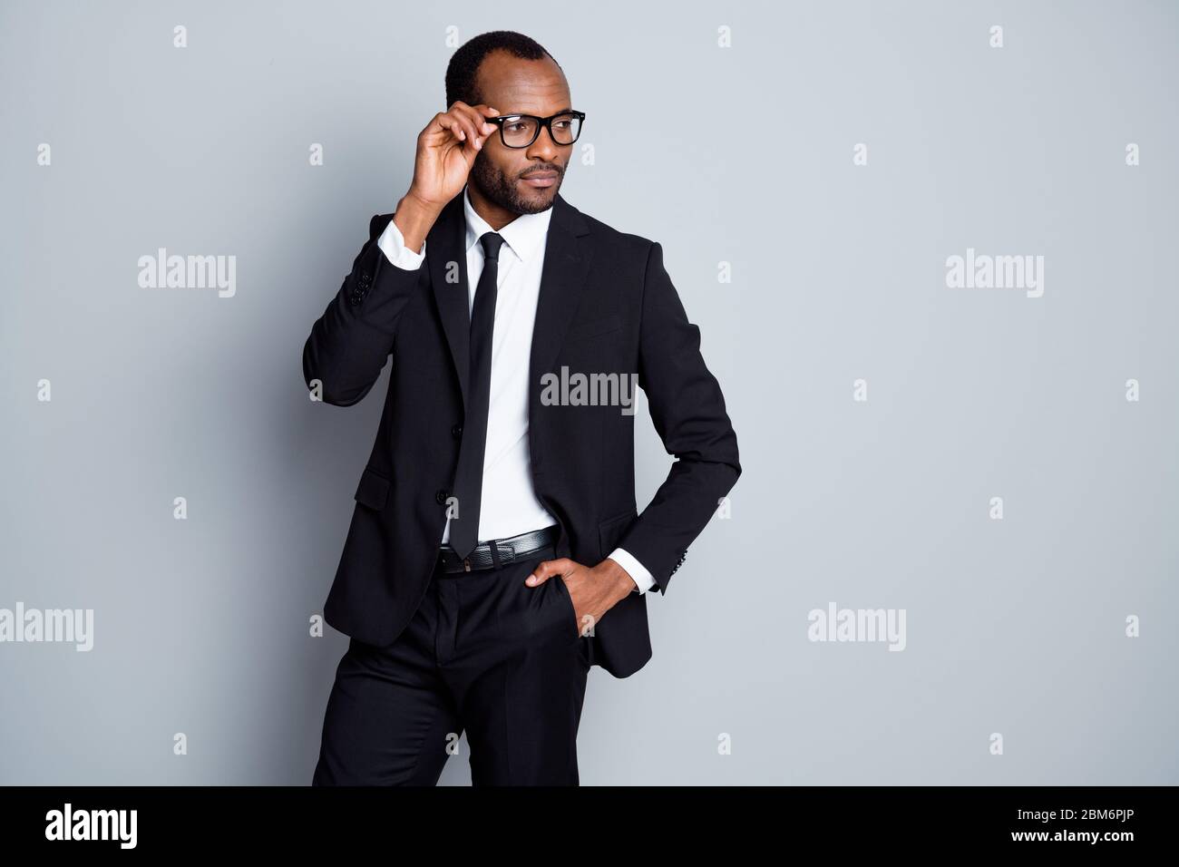 Posing spectacles suit tie hi-res stock photography and images - Alamy