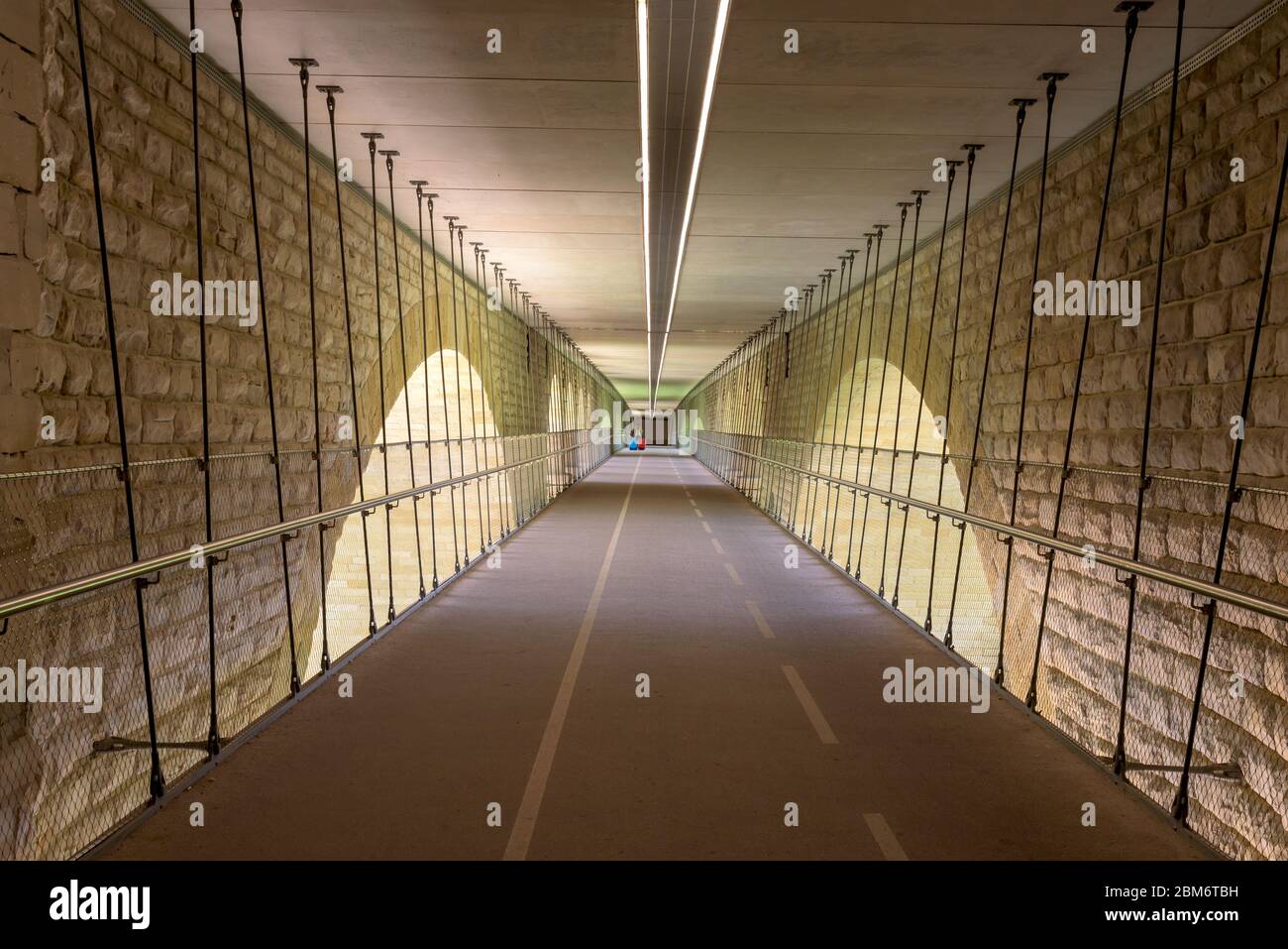 Pedestrian passage under the road of the suspended Adolphe bridge with ...