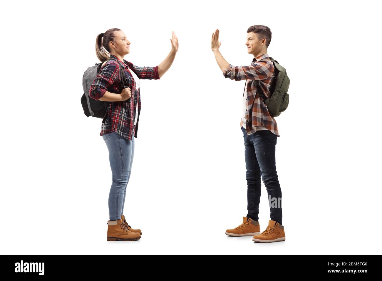 Boy greeting friend hi-res stock photography and images - Alamy