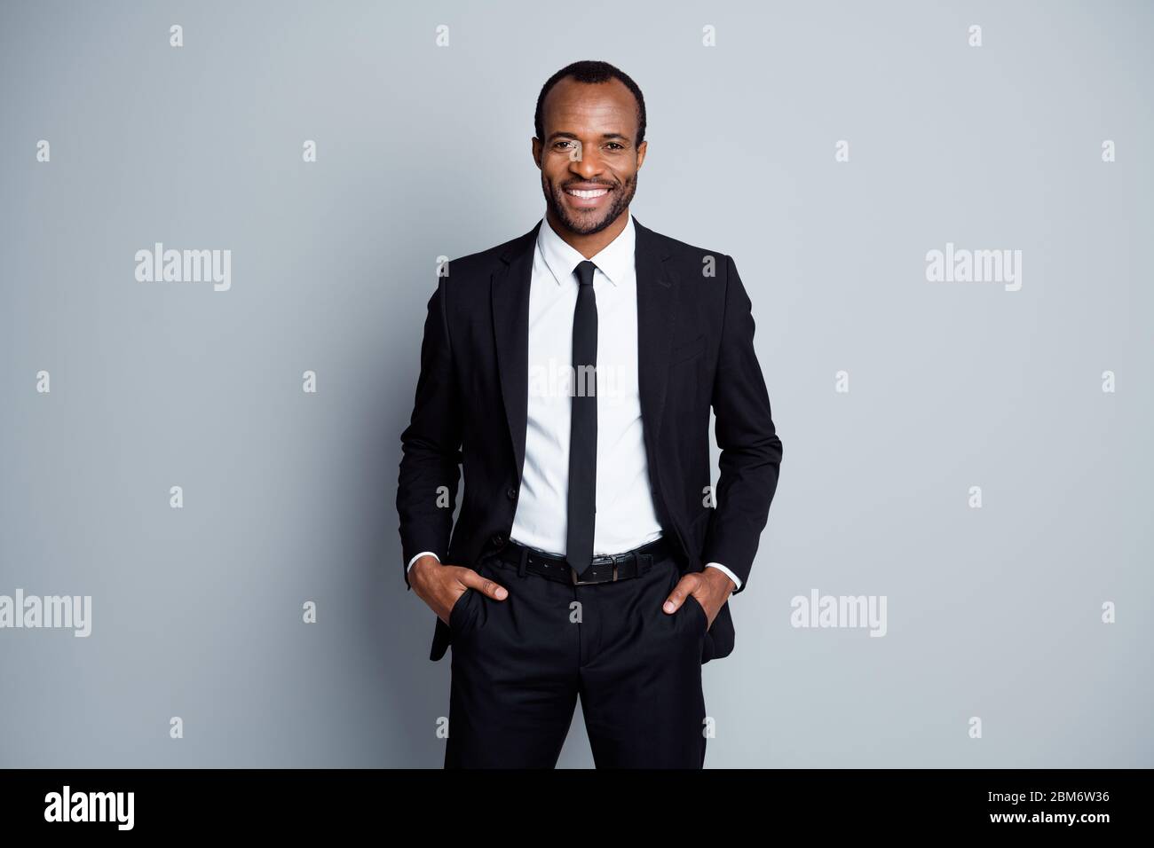 Happy financier in formal suit hi-res stock photography and images - Alamy