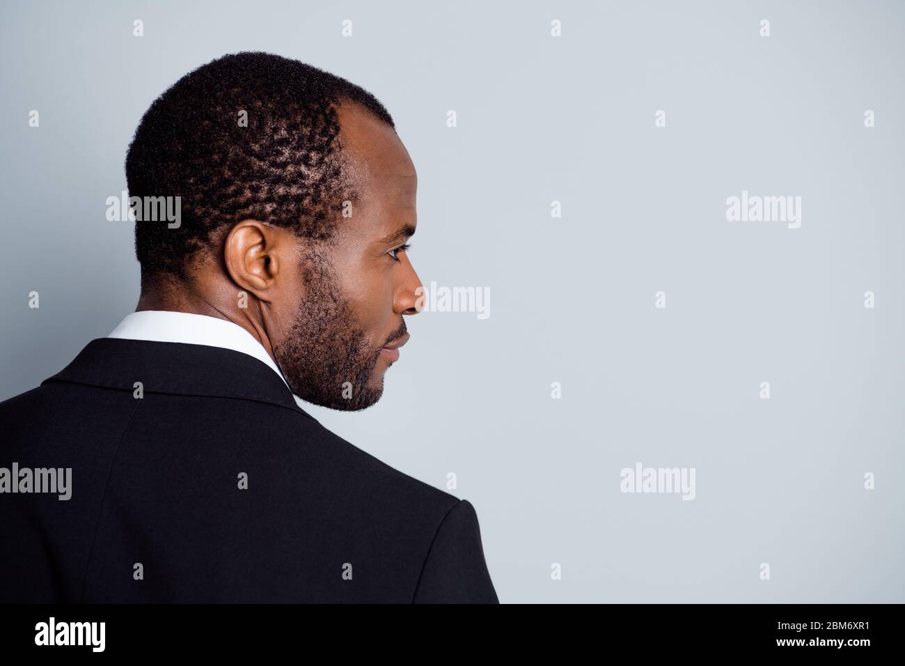 Close-up rear back behind view portrait of his he nice attractive ...