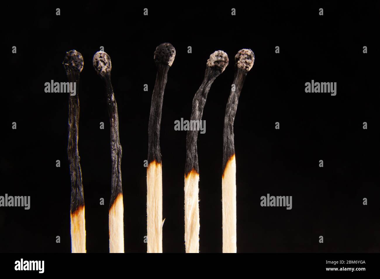 Burnt matchsticks in black background hi-res stock photography and ...